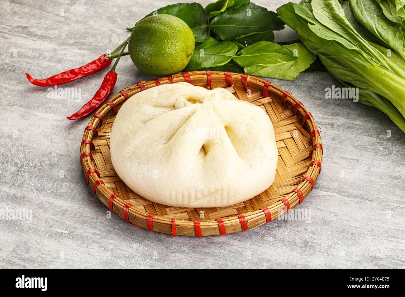 Chinese steamed bun Dim sum with meat Stock Photo - Alamy