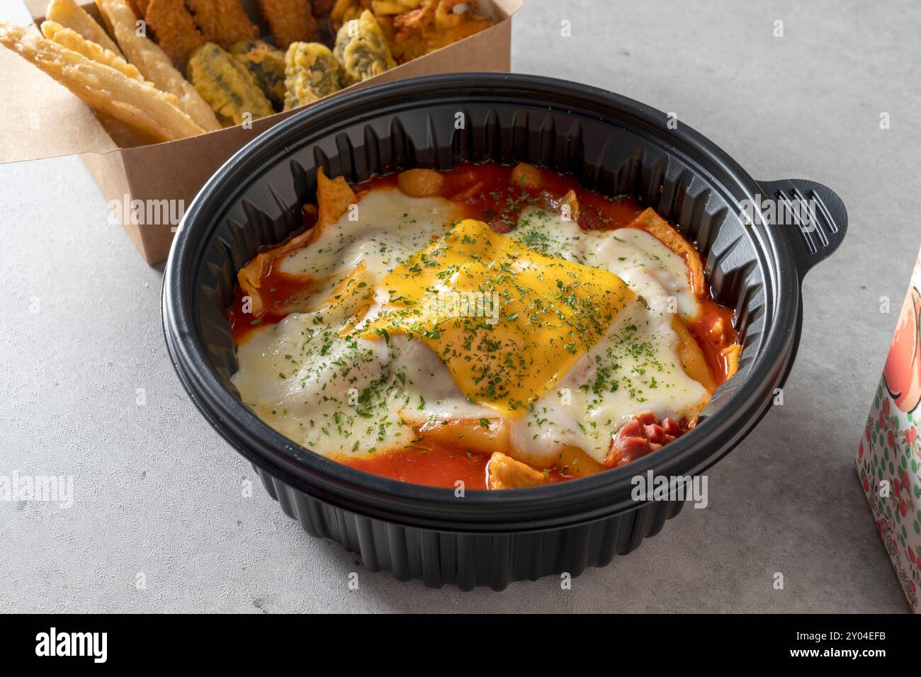Fish cake soup, tteokbokki, spicy potato pancake, red pepper fries ...