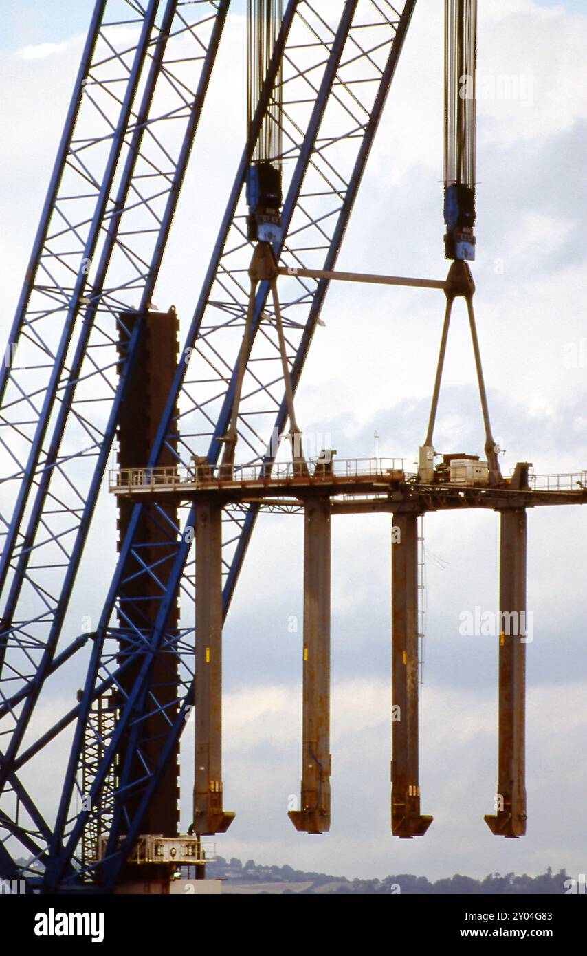 Lampson Translift crane on its jack up with the caisson lifting rig on ...