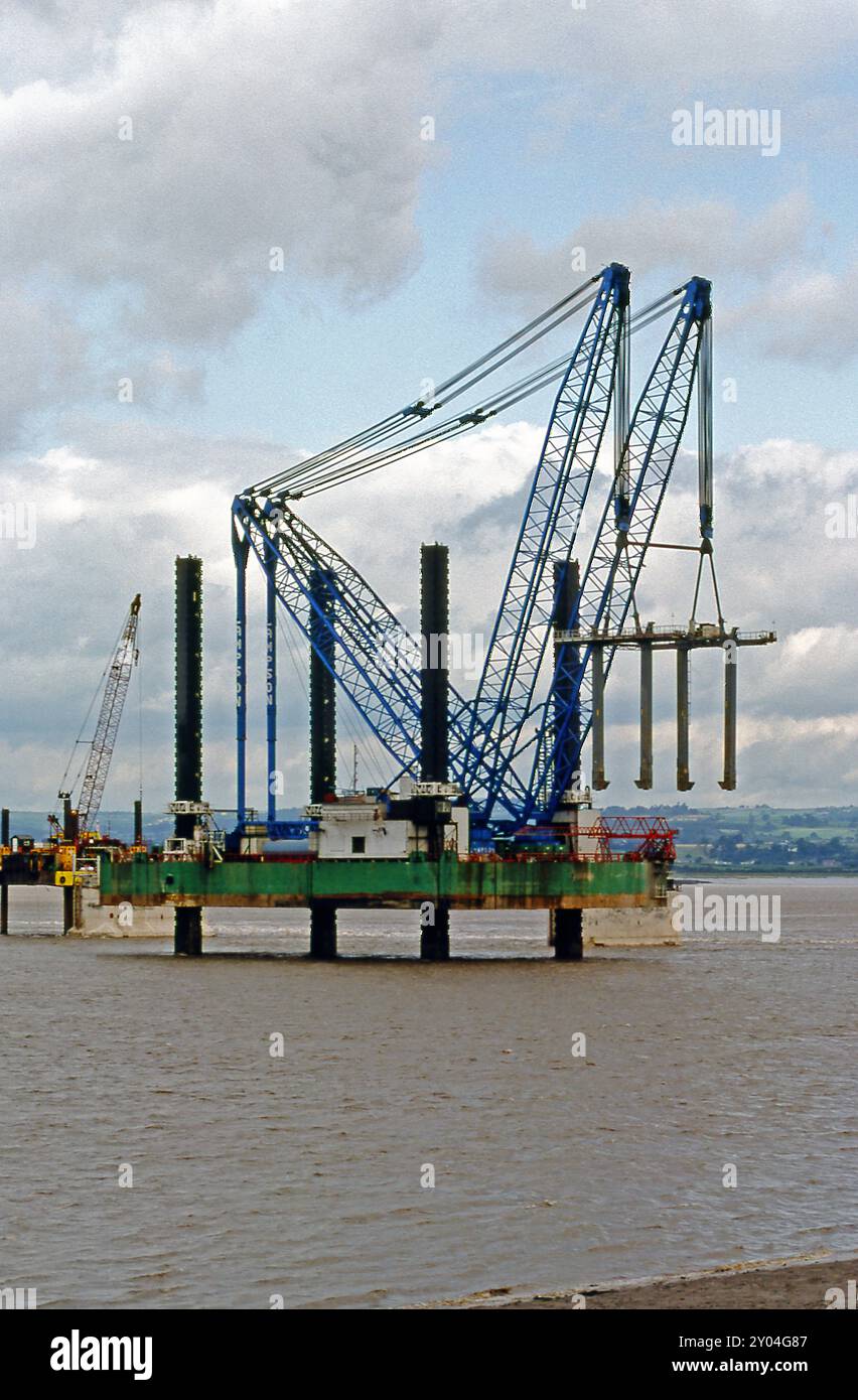 Lampson Translift crane on its jack up with the caisson lifting rig on ...