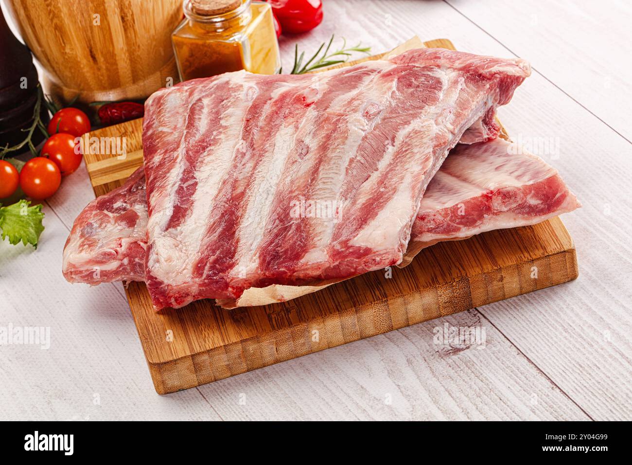 Raw pork ribs over board for cooking Stock Photo - Alamy