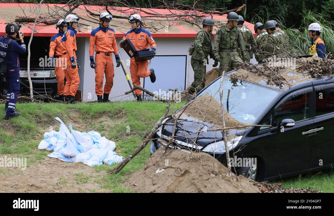 A disaster drill is held at a park in Suita City, Osaka Prefecture on ...