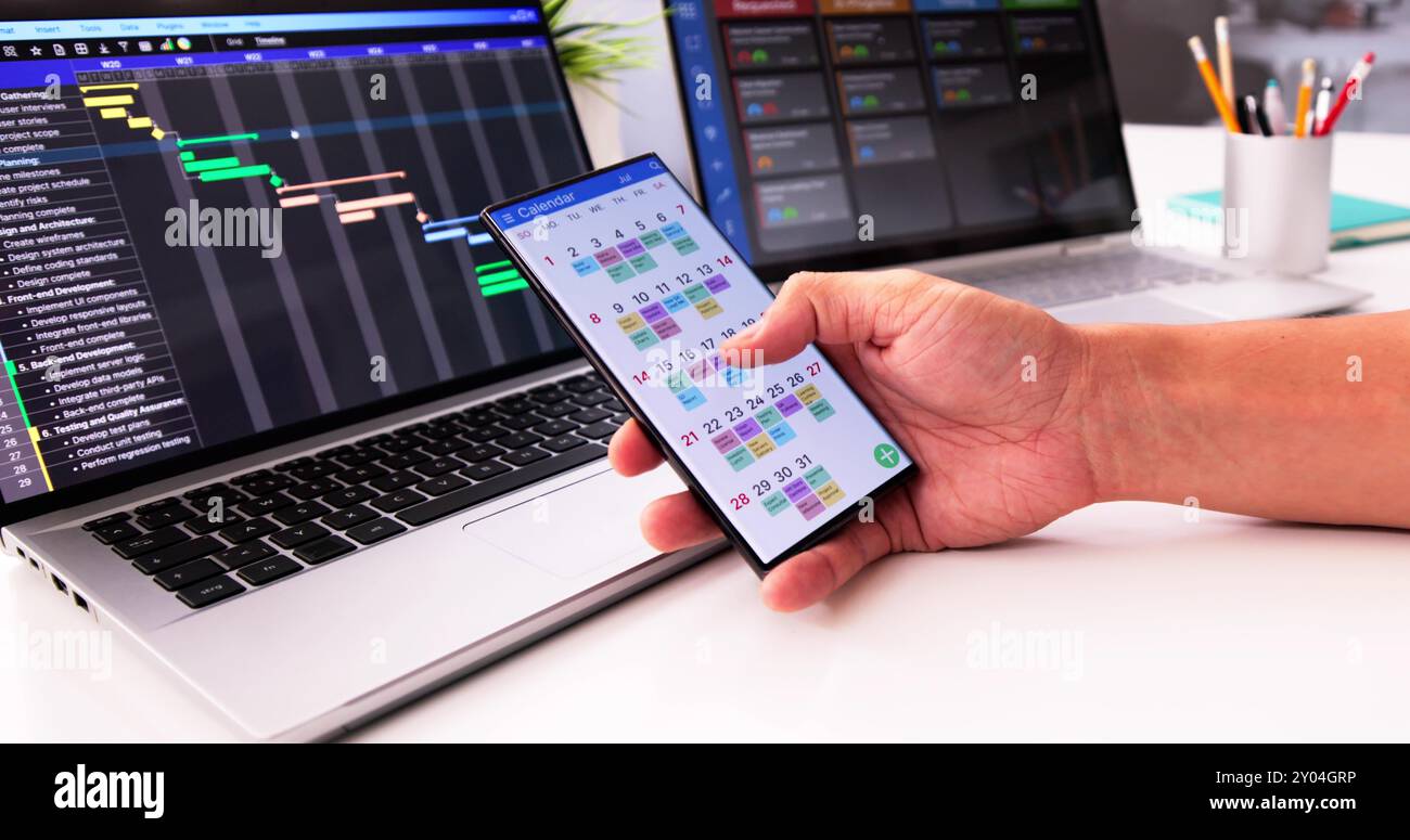 Appointment Schedule Planner And Date Calendar On Laptop And Phone ...