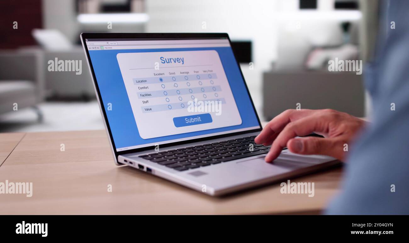 Survey Questionnaire Or Poll On Tablet Computer At Home Stock Photo - Alamy