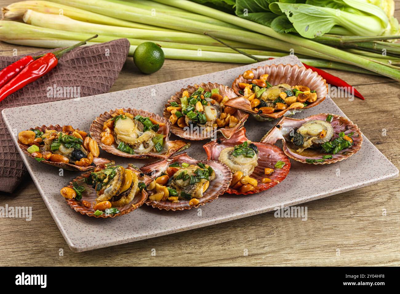 Baked scallops with scalion oil and green onion Stock Photo - Alamy