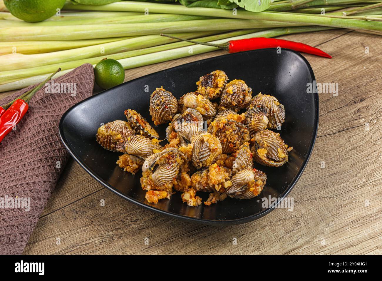 Blood Cockle Fried With Garlic and spices Stock Photo - Alamy