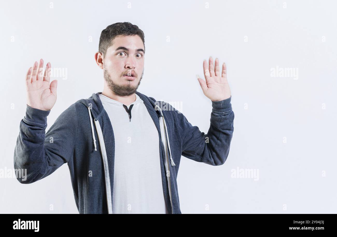 Scared man with raised hands isolated. Person with scared face with ...