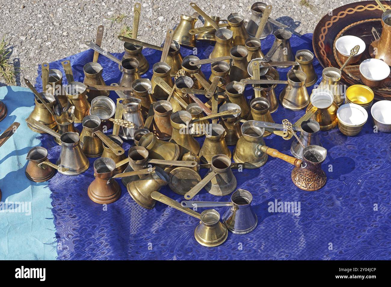 Many Old brass and copper coffee pots Stock Photo - Alamy