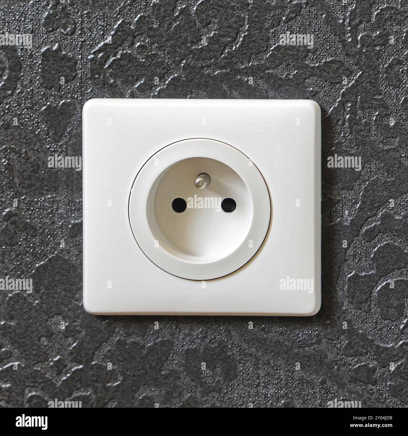 Electric socket with ground in France Stock Photo - Alamy