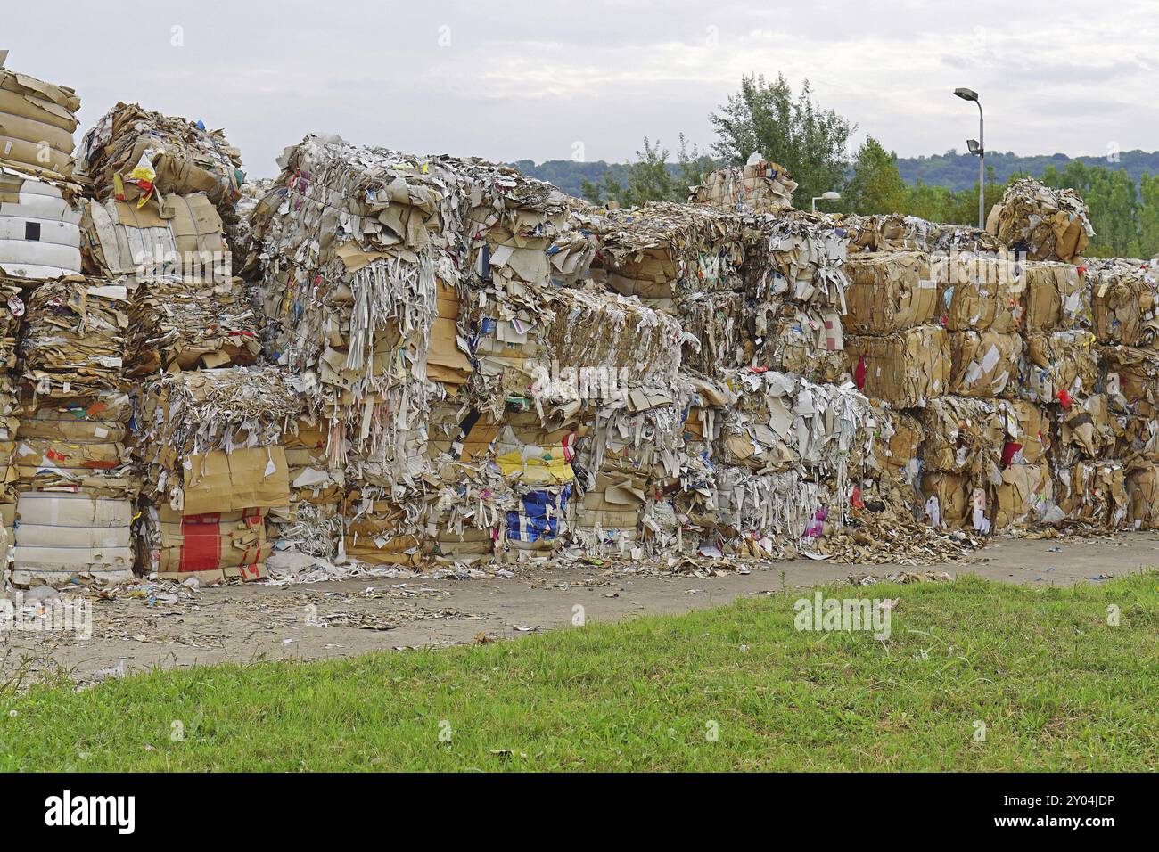 Paper and carboard carton material stacked for recycling Stock Photo ...