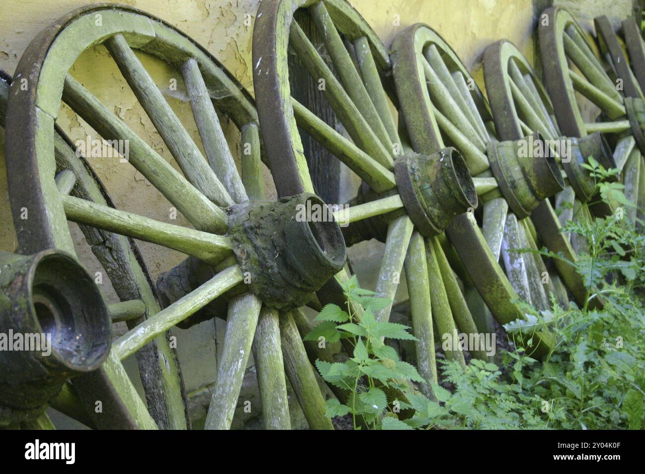 Discarded wagon wheels Stock Photo - Alamy