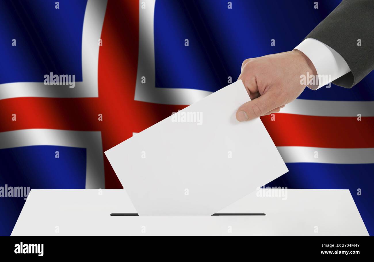 The Icelandic flag and the hand with the bulletin about the ballot box ...