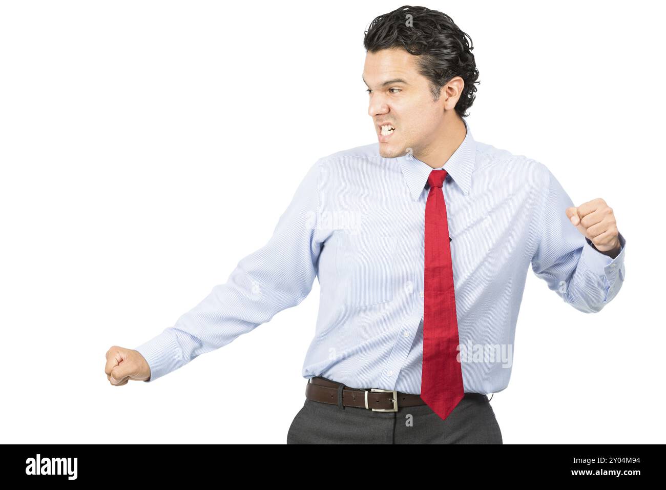 An aggressive hispanic male business professional in formal dress shirt ...