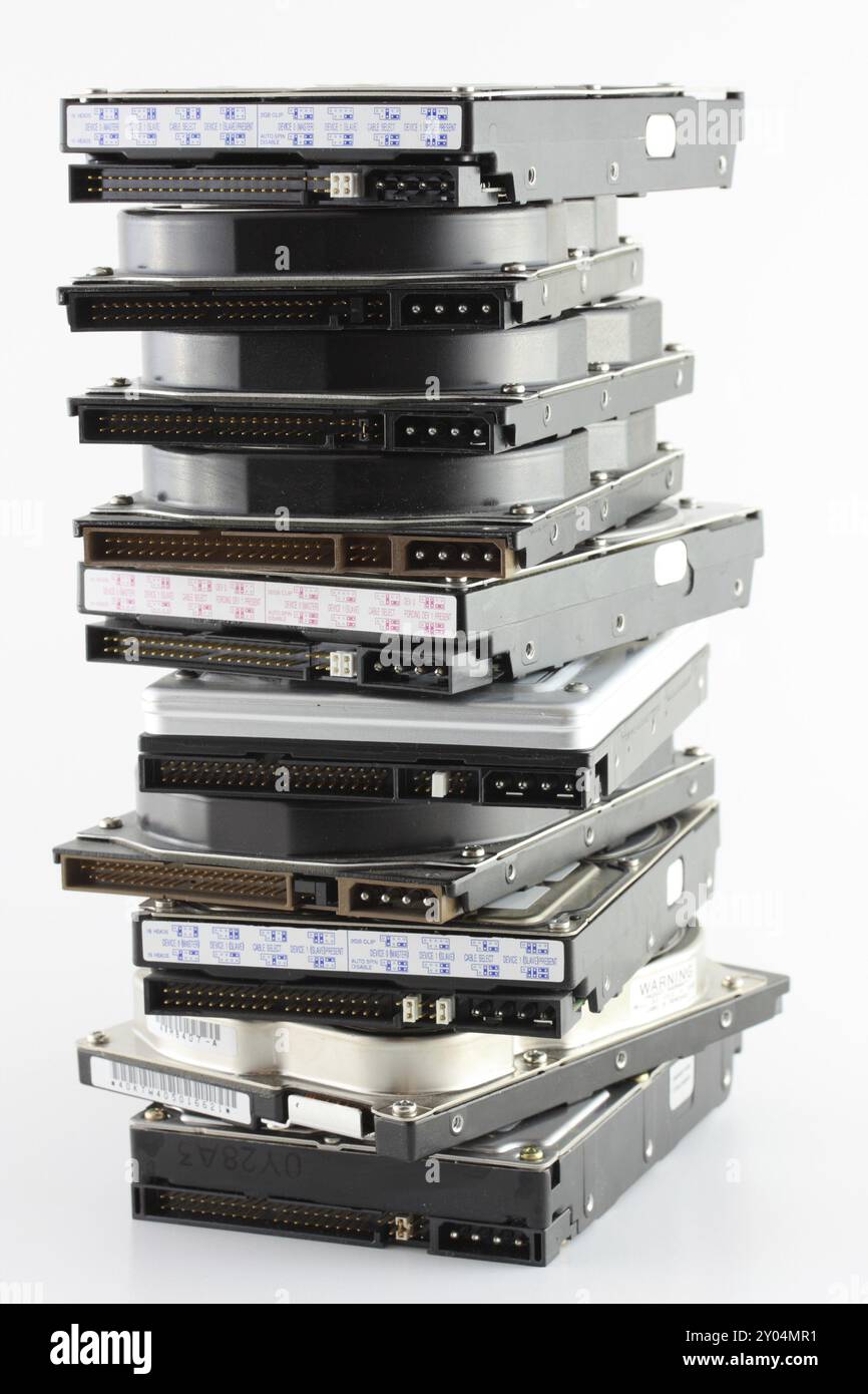 A lot of computer hard disks Stock Photo - Alamy