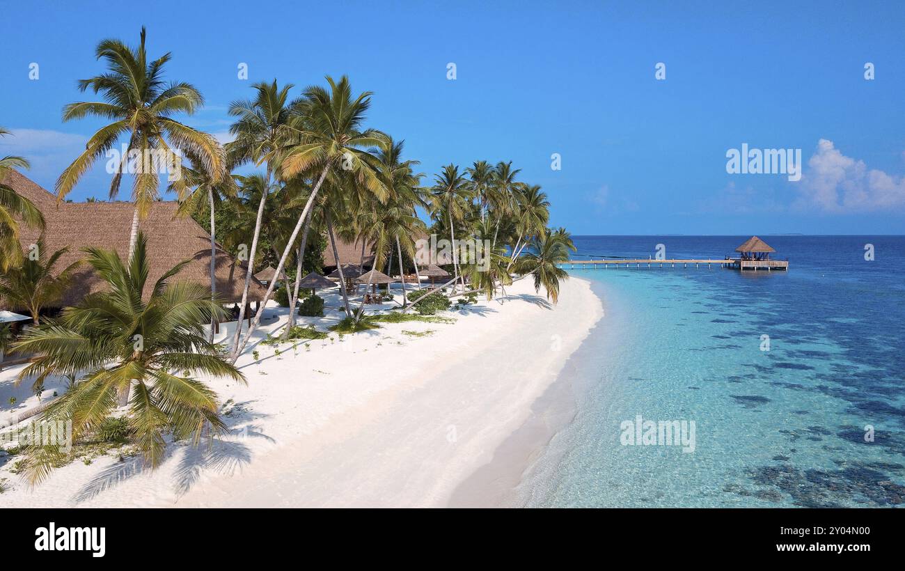 Bird's eye view of sandy beach Maldives beach beach and narrow lagoon ...