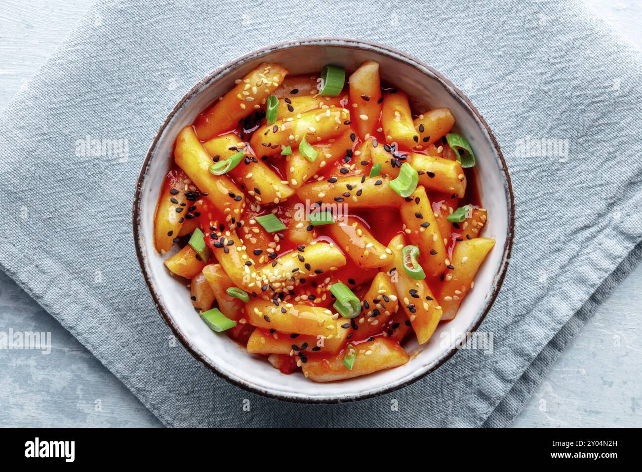 Tteokbokki or topokki, Korean street food, spicy rice cakes in red ...