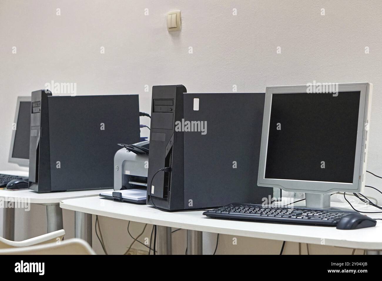 Desktop computers with lcd screen and printer Stock Photo - Alamy