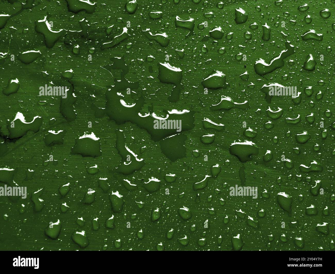 Water drops on jade green color metallic surface Stock Photo - Alamy