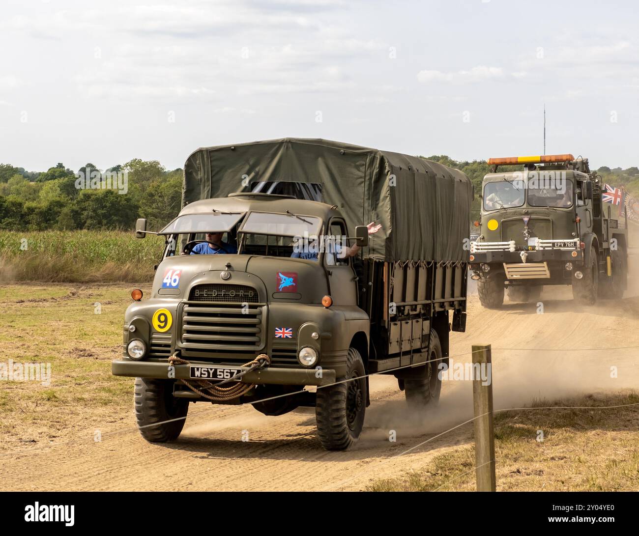 Off road military truck driving around a dust track at a World War Two ...