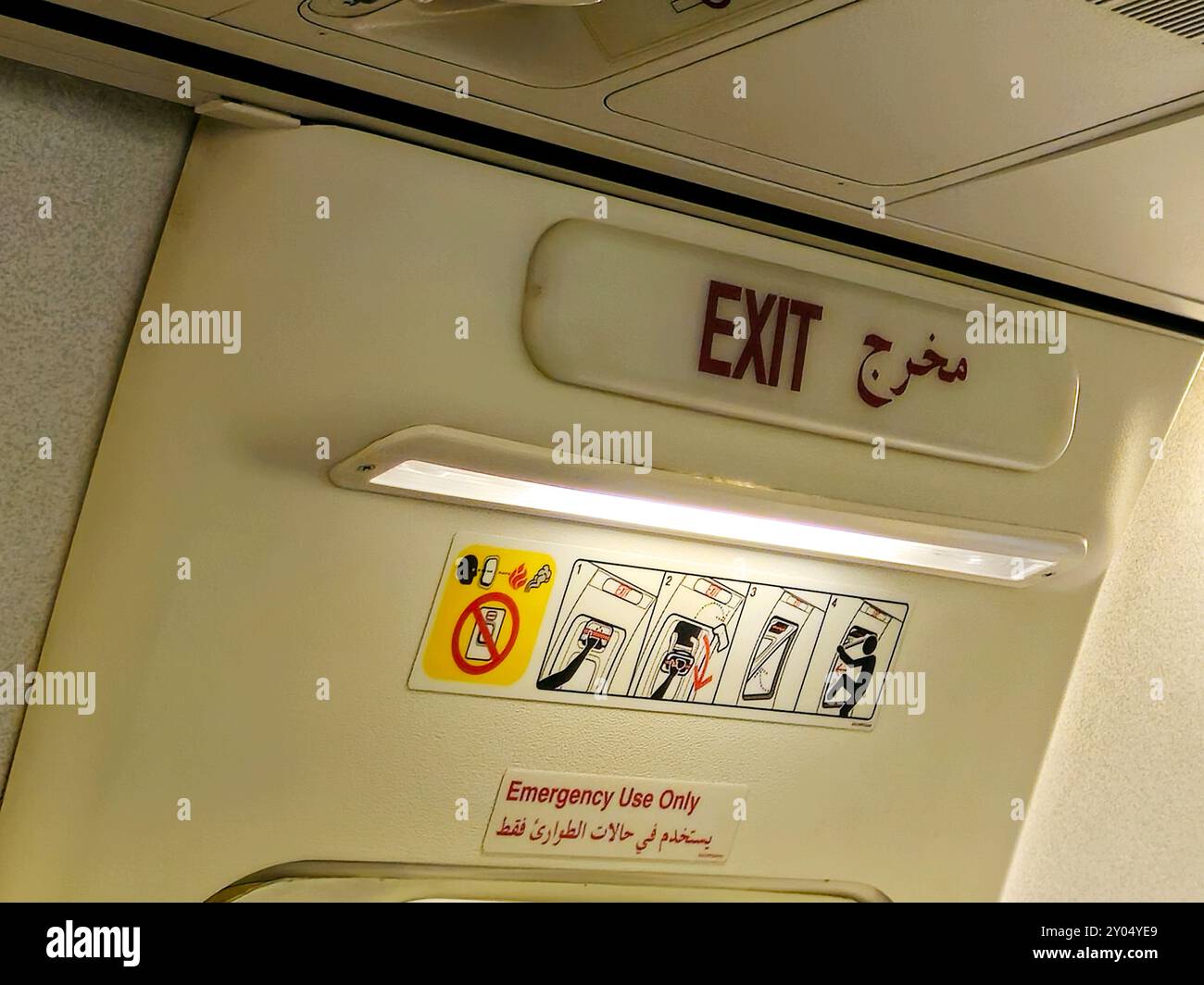 Cairo, Egypt, June 3 2024: Emergency exit of an airplane, aeroplane ...