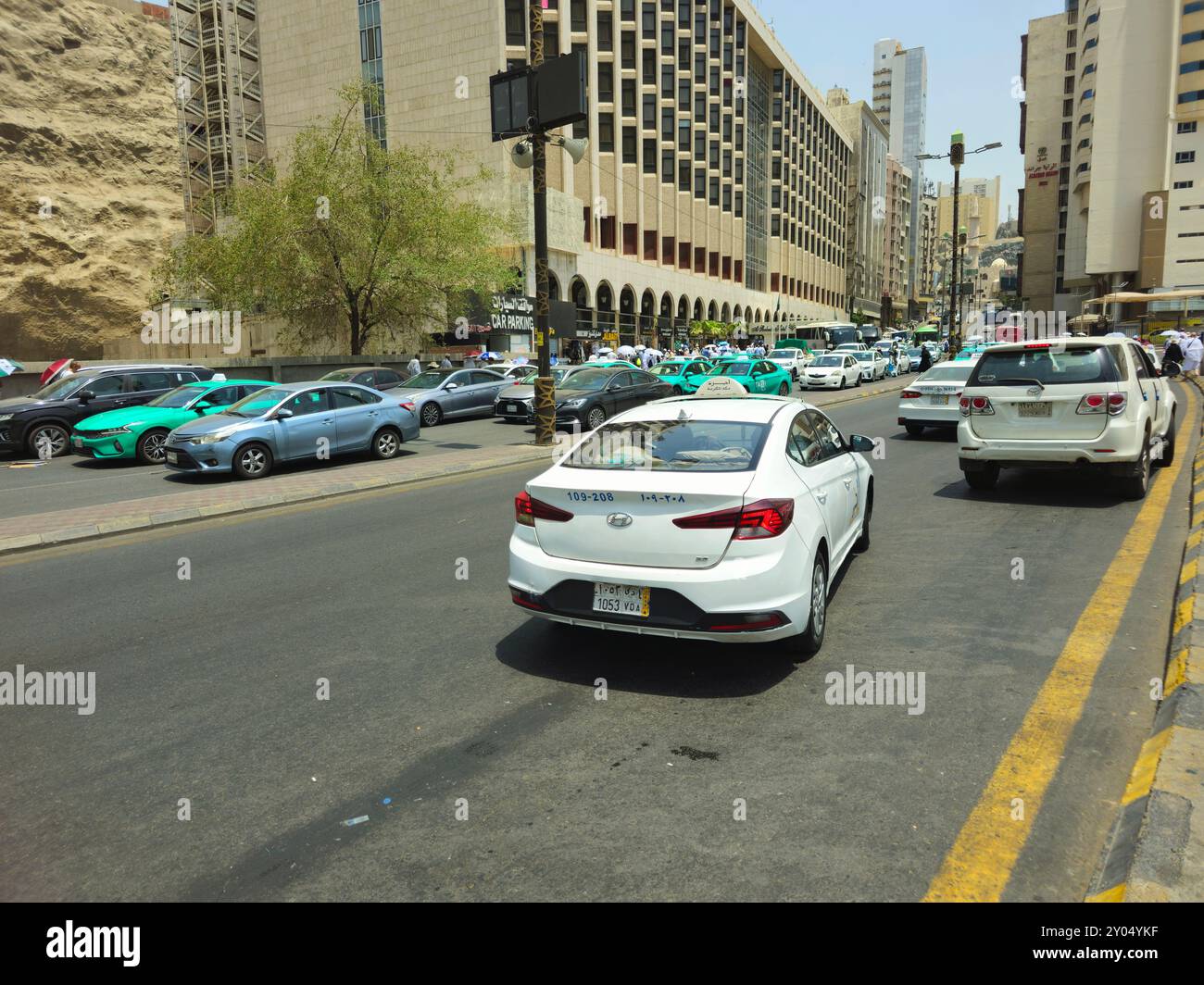 Mecca, Saudi Arabia, June 4 2024: Mecca Makkah Taxi, used to transport Hajj pilgrims inside and ...