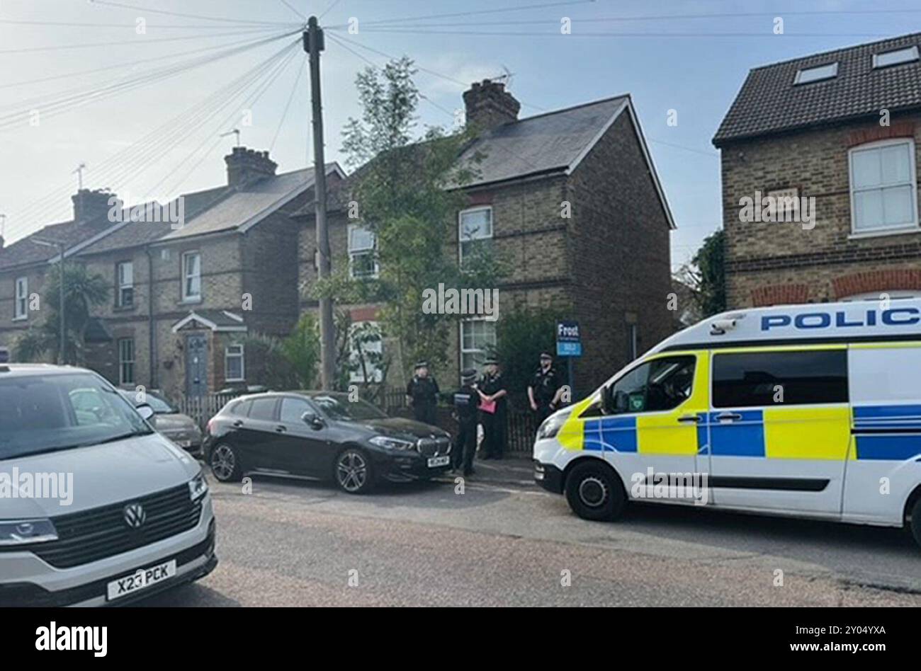 Police in Bremer Road, Staines-Upon-Thames near a property where three ...