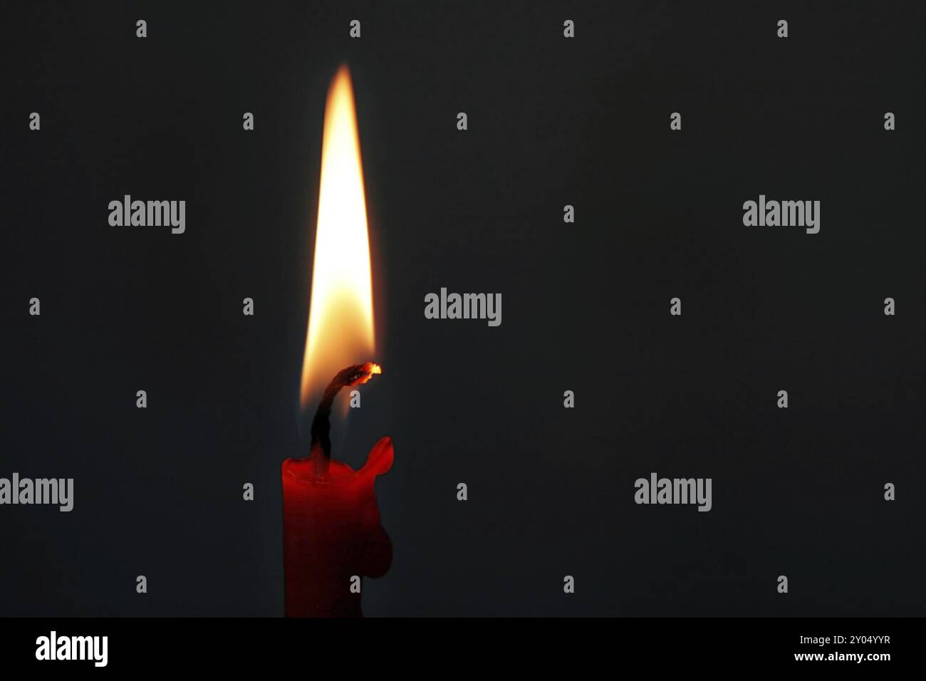 Candle flame red burns in hi-res stock photography and images - Alamy