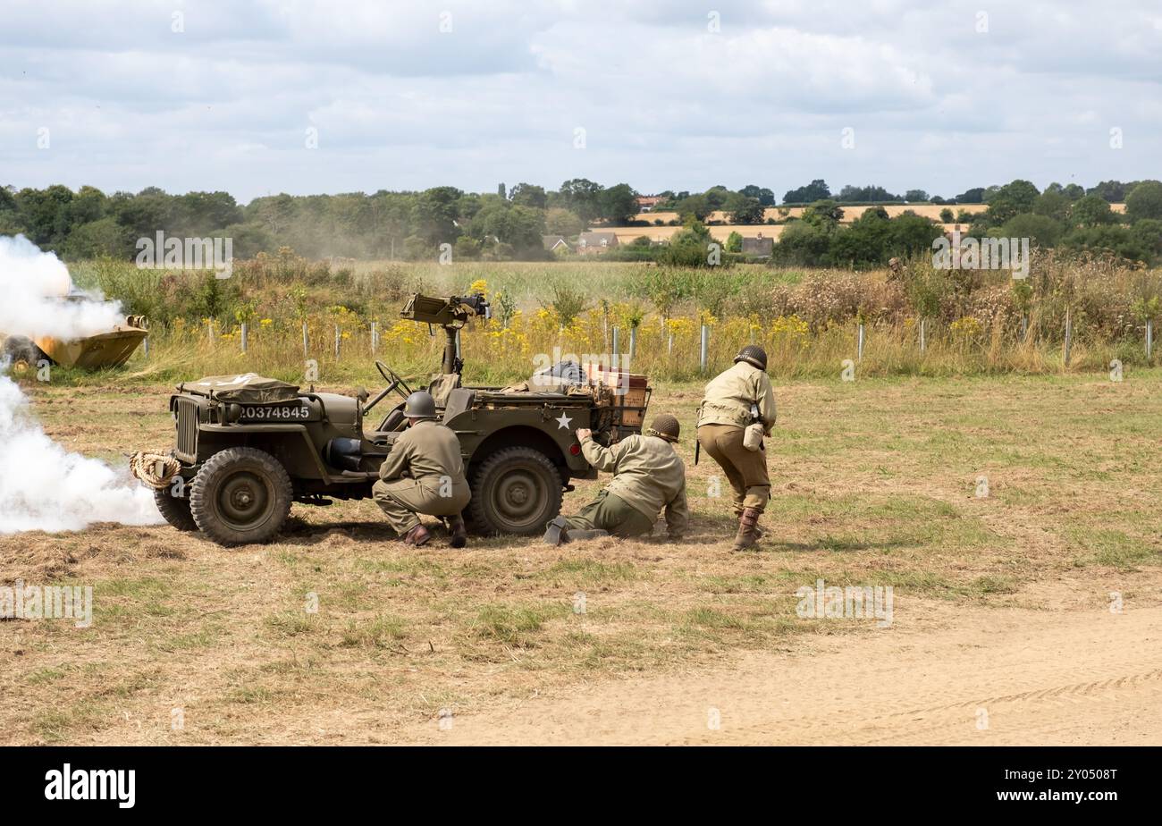 Army personnel on a military training session with an off road SUV and ...