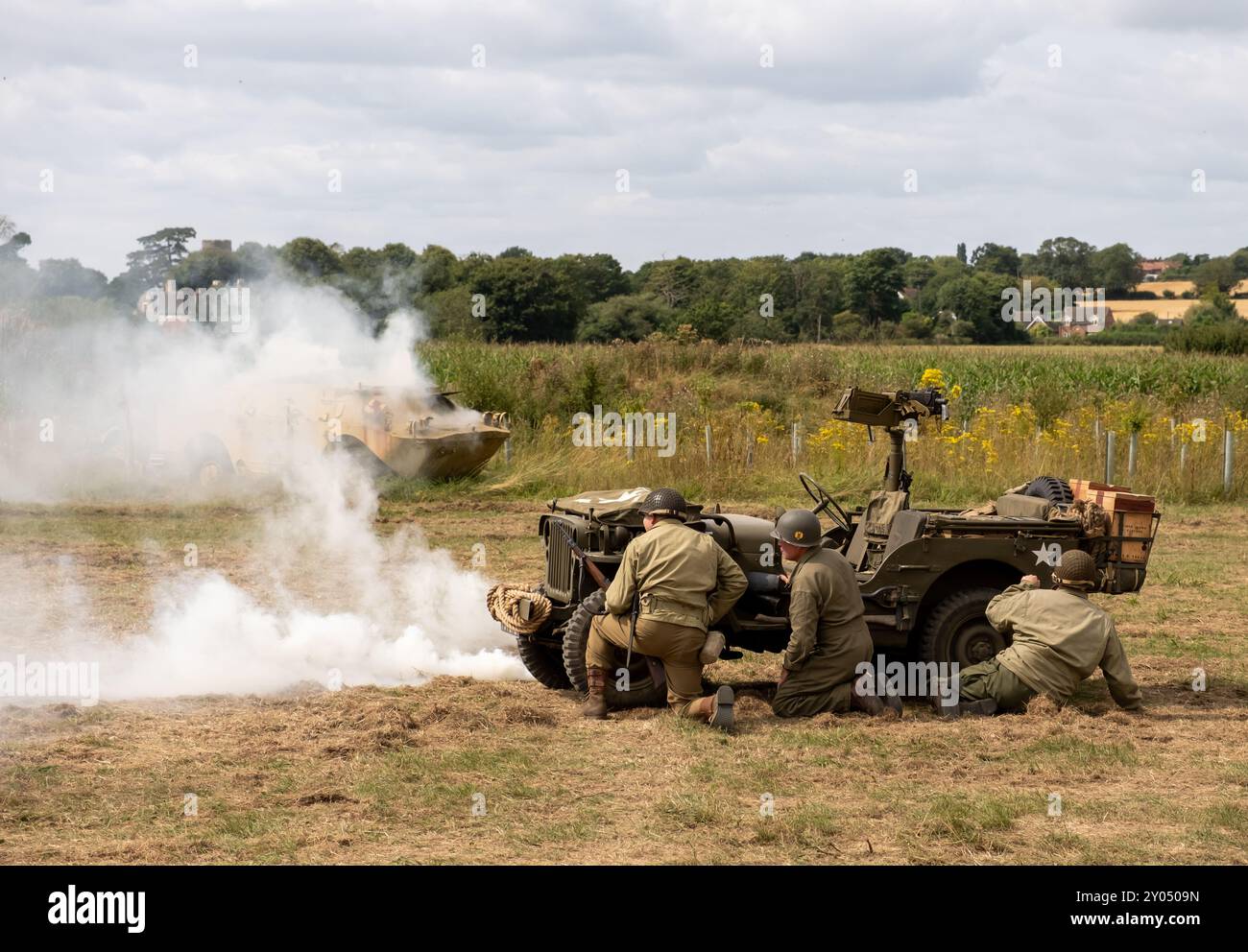 Army personnel on a military training session with an off road SUV and ...
