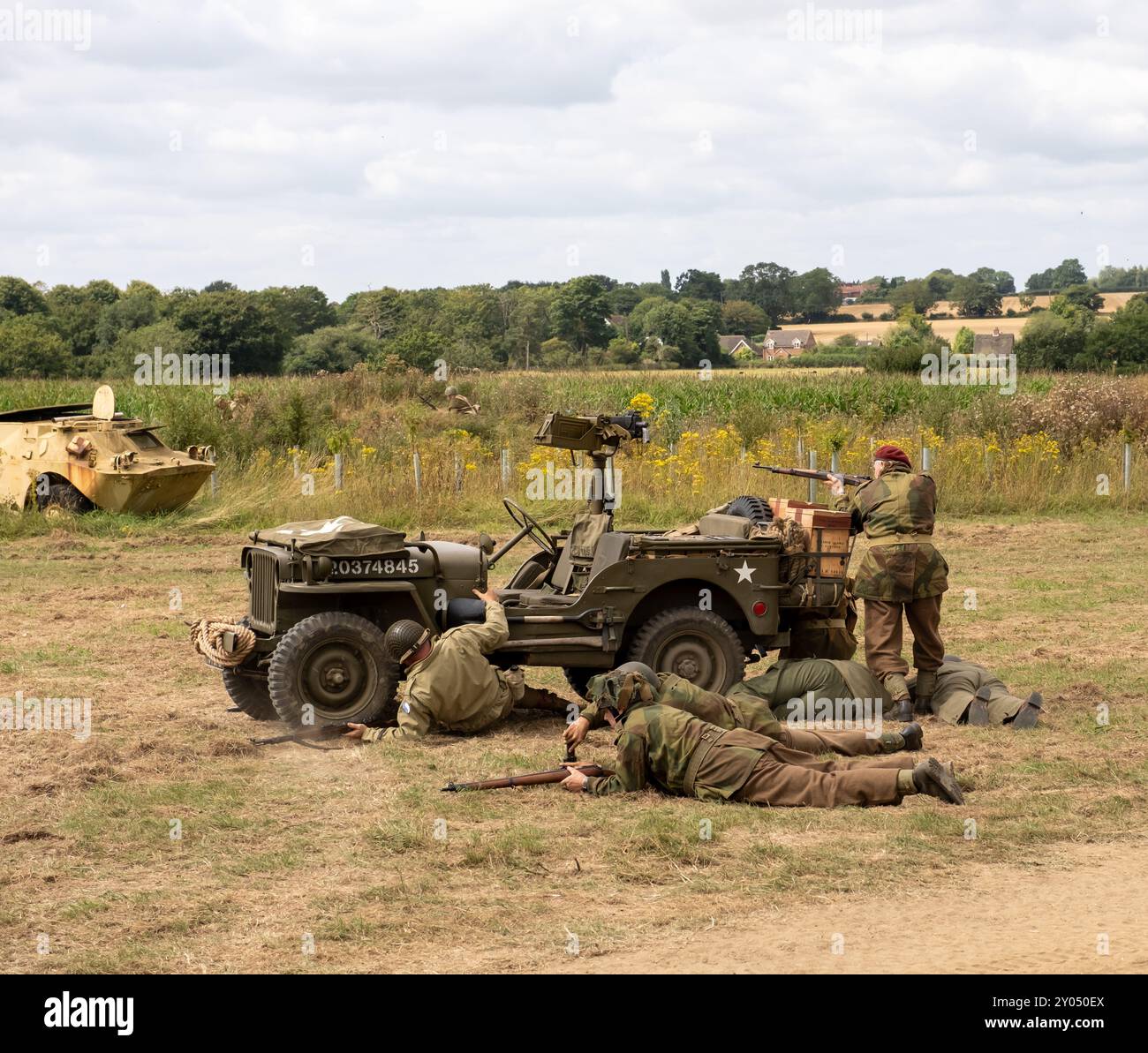 Army personnel on a military training session with an off road SUV and ...