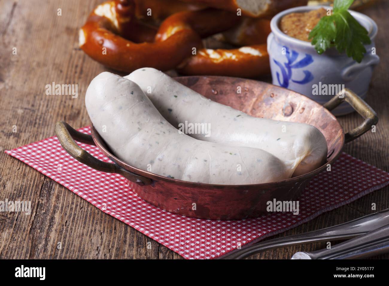 Bavarian veal sausage in a copper pot Stock Photo - Alamy