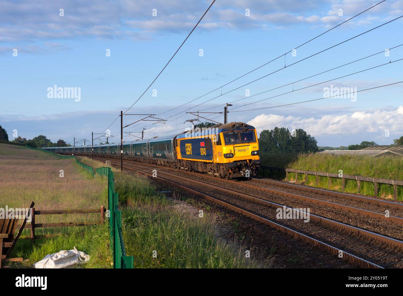 The northbound Lowland Caledonian sleeper on the west coast mainline in Lancashire hauled by a ...