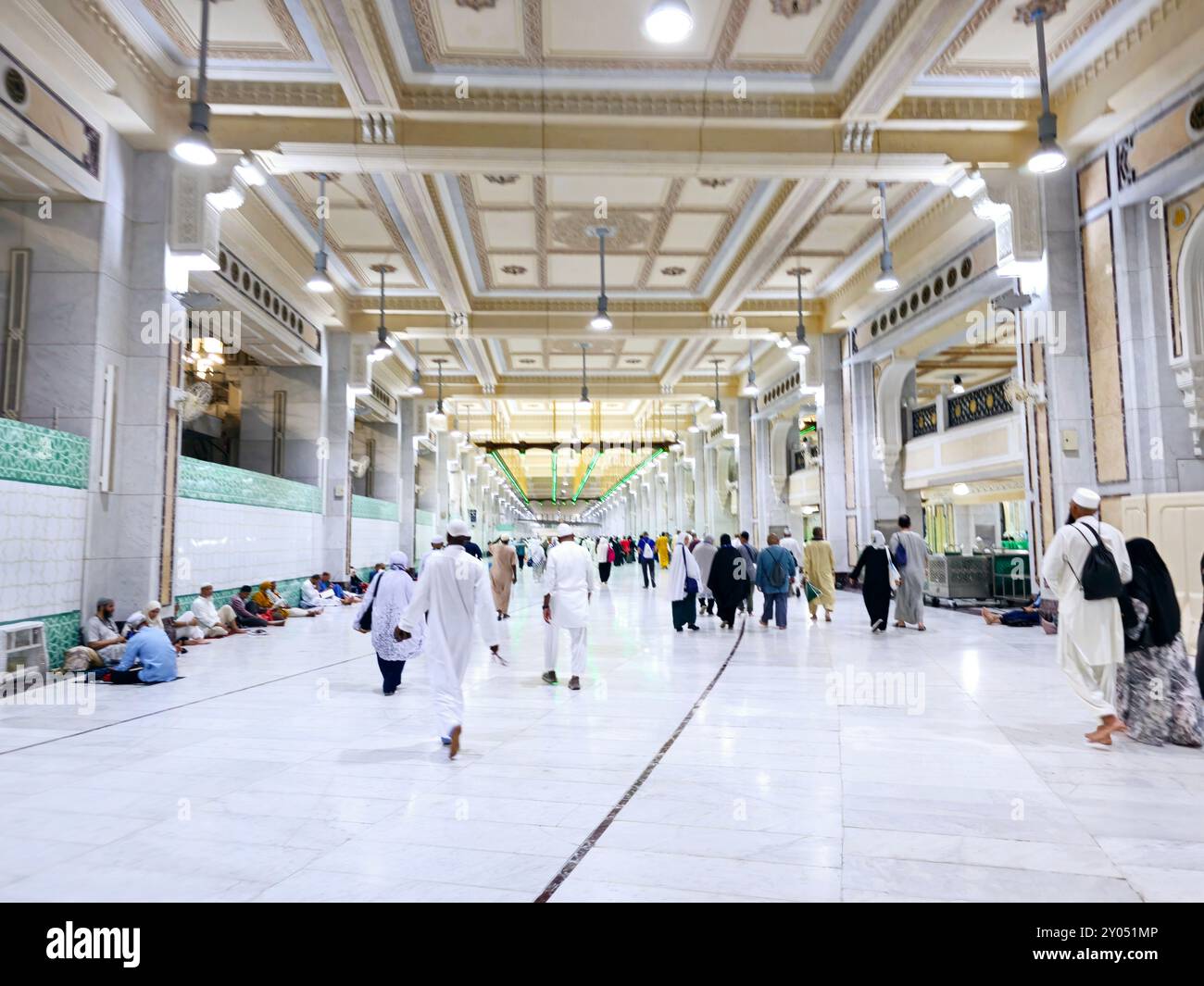Mecca, Saudi Arabia, June 4 2024: Muslims travel back and forth between ...