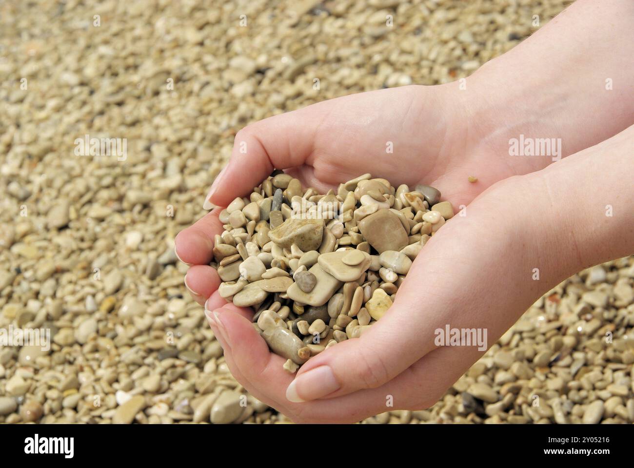 Hand with stones, hand with stones 04 Stock Photo - Alamy