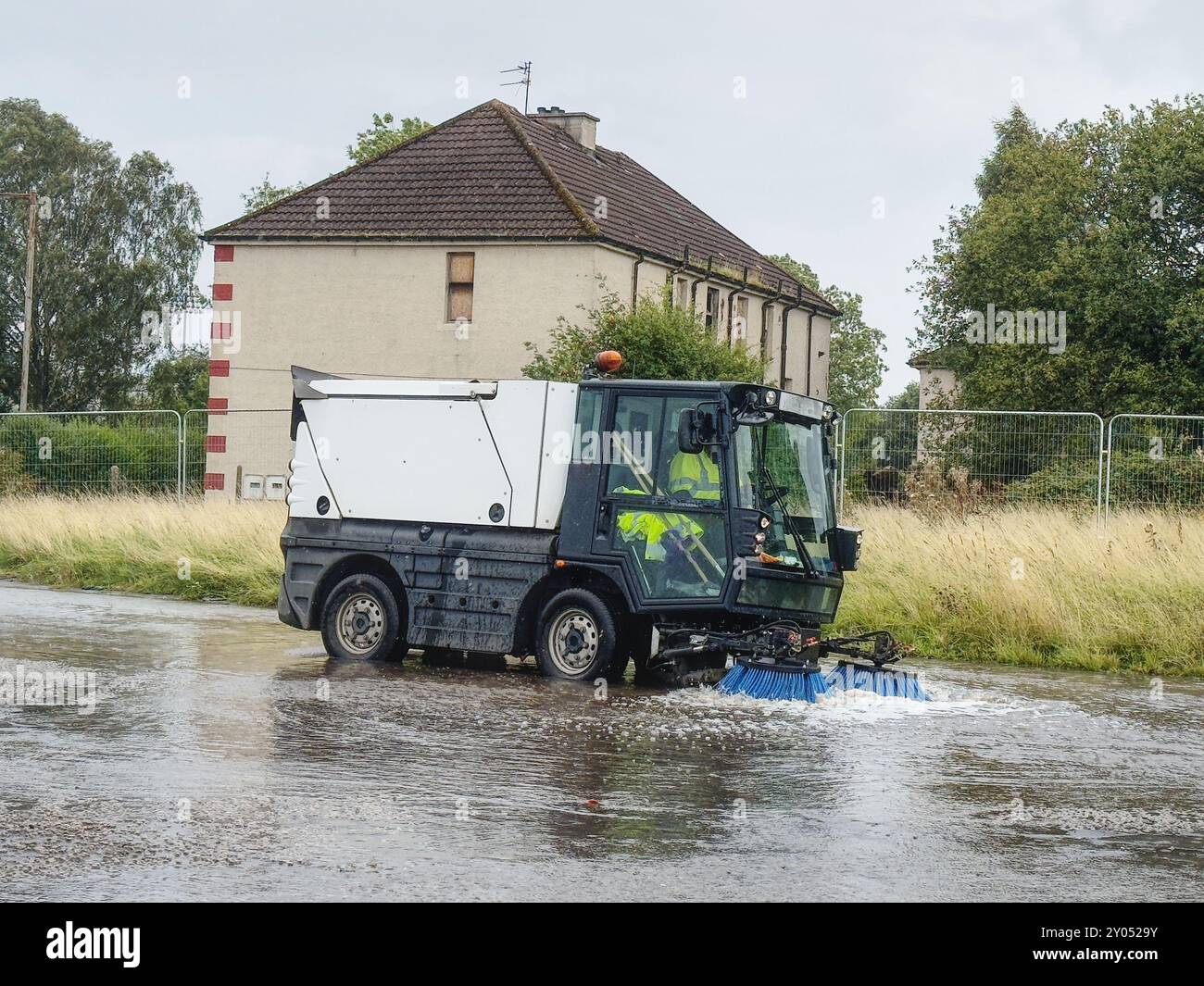 Brushing away water hi-res stock photography and images - Alamy