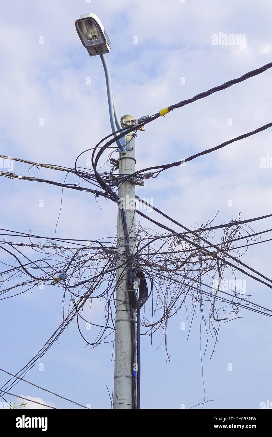 Utility pole with bunch of electric wires and cables Stock Photo - Alamy