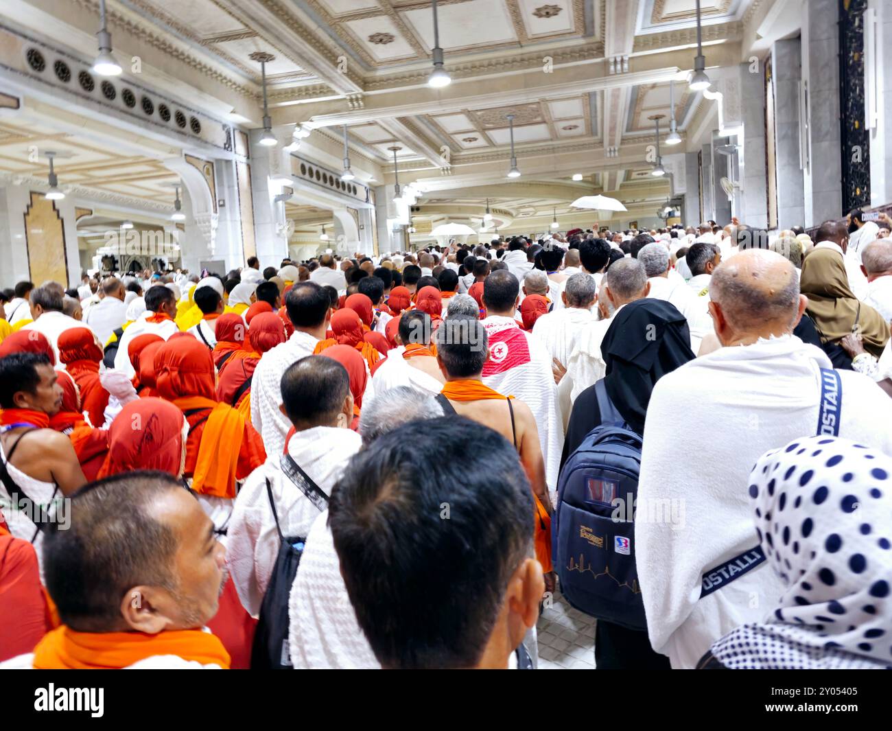 Mecca, Saudi Arabia, June 6 2024: Muslims travel back and forth between ...