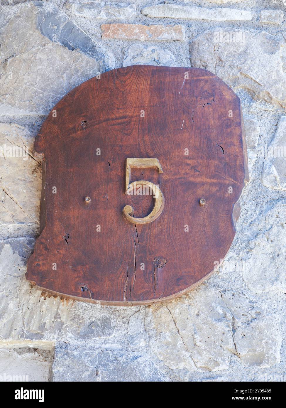poster on the wall. number in wood Stock Photo - Alamy