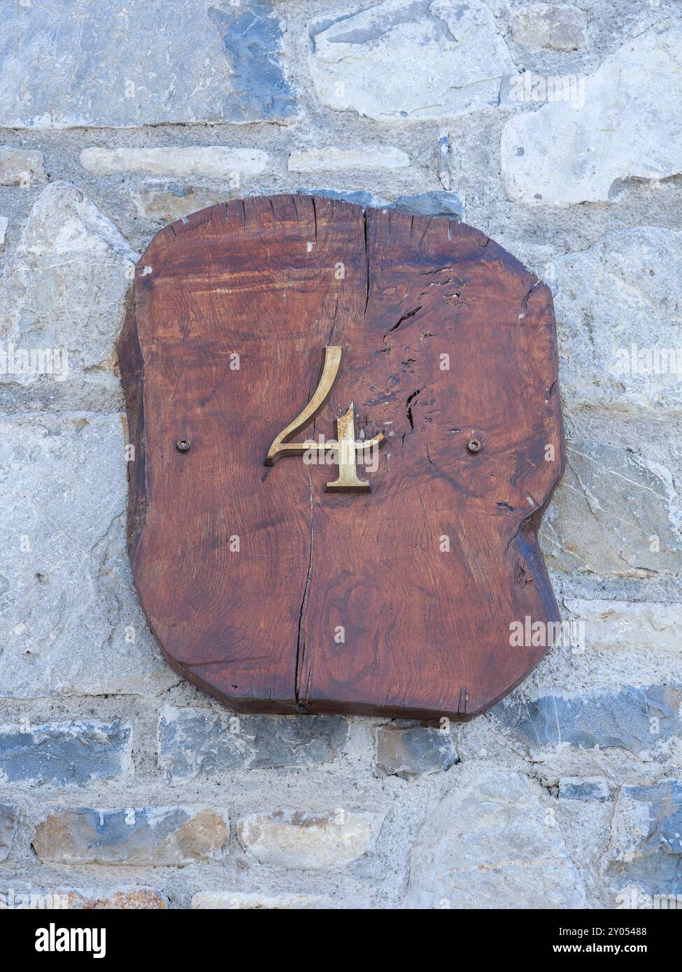 poster on the wall. number in wood Stock Photo - Alamy