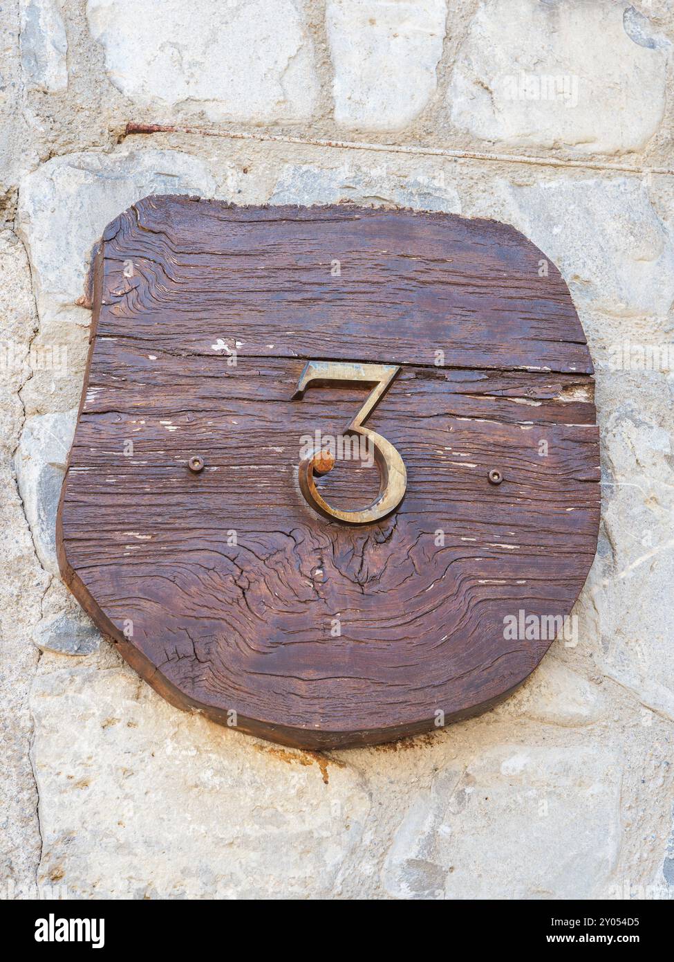 poster on the wall. number in wood Stock Photo - Alamy