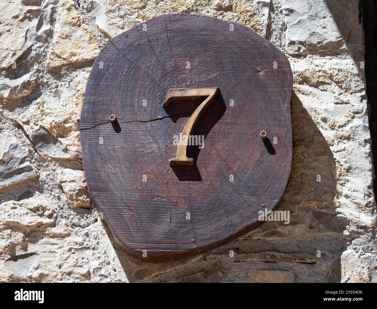 poster on the wall. number in wood Stock Photo - Alamy