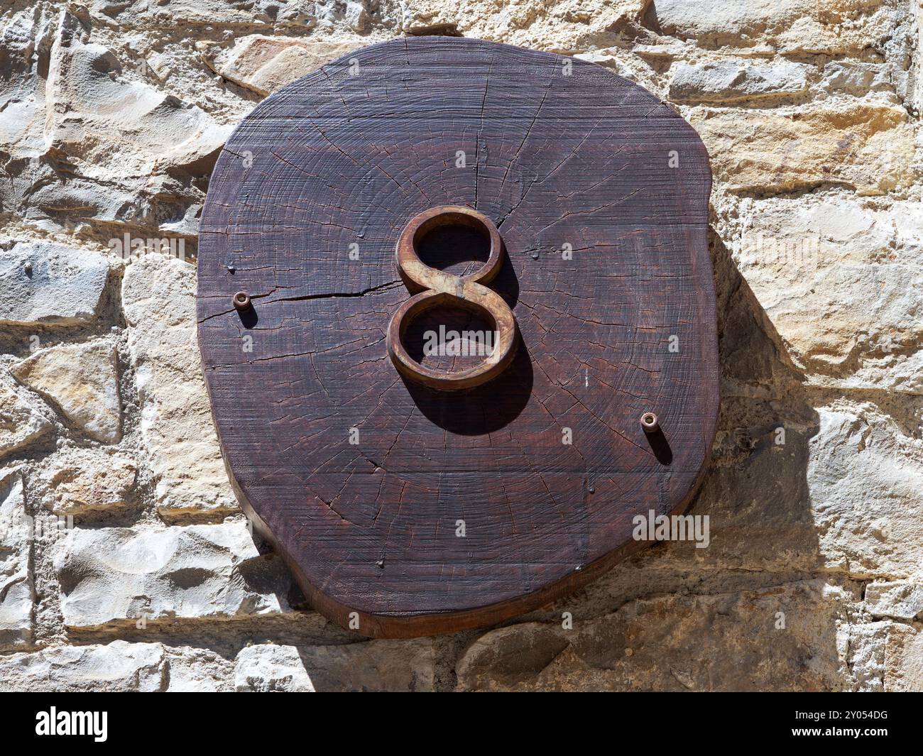 poster on the wall. number in wood Stock Photo - Alamy