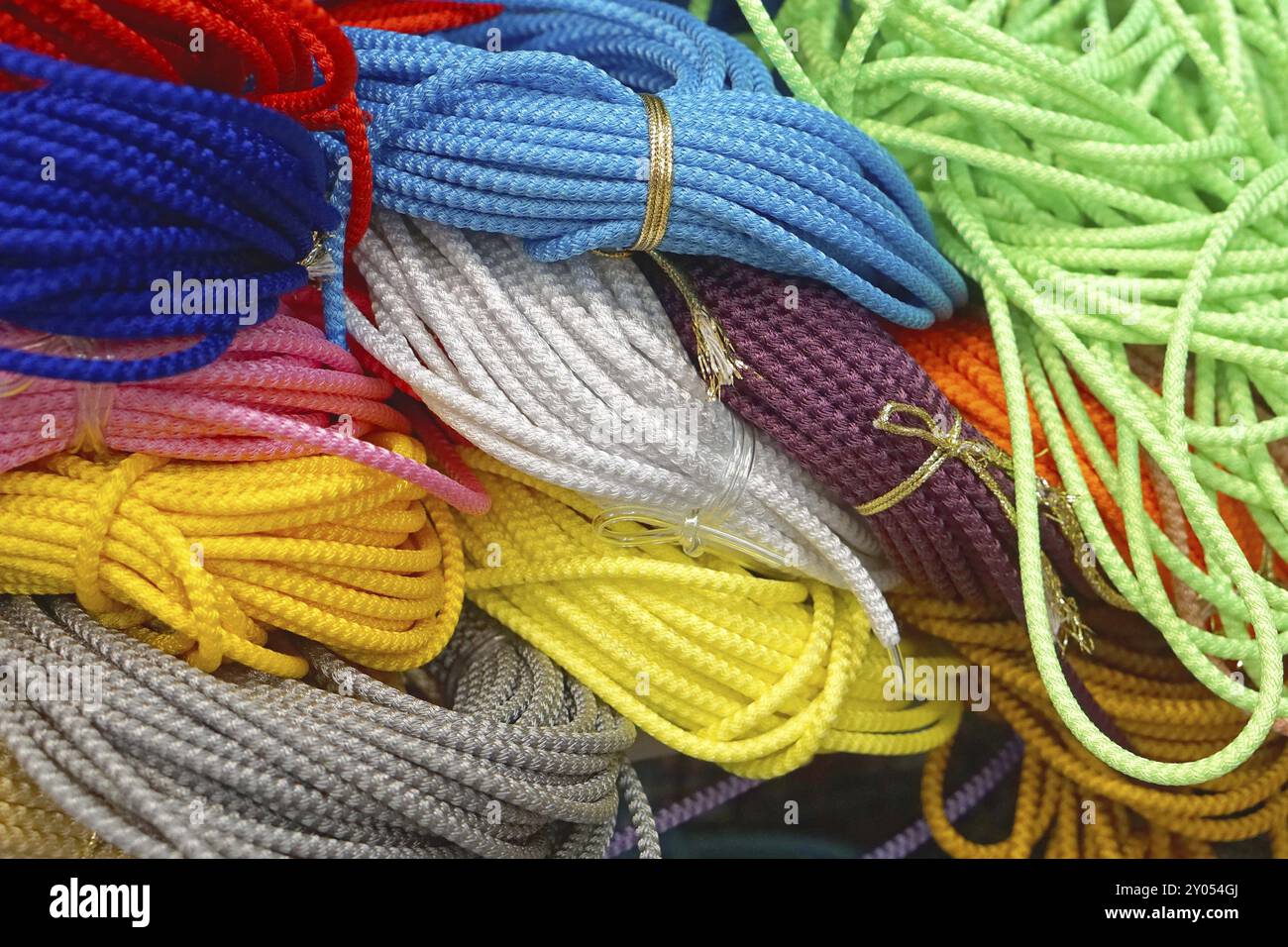 Various color decorative ropes and yarns Stock Photo - Alamy