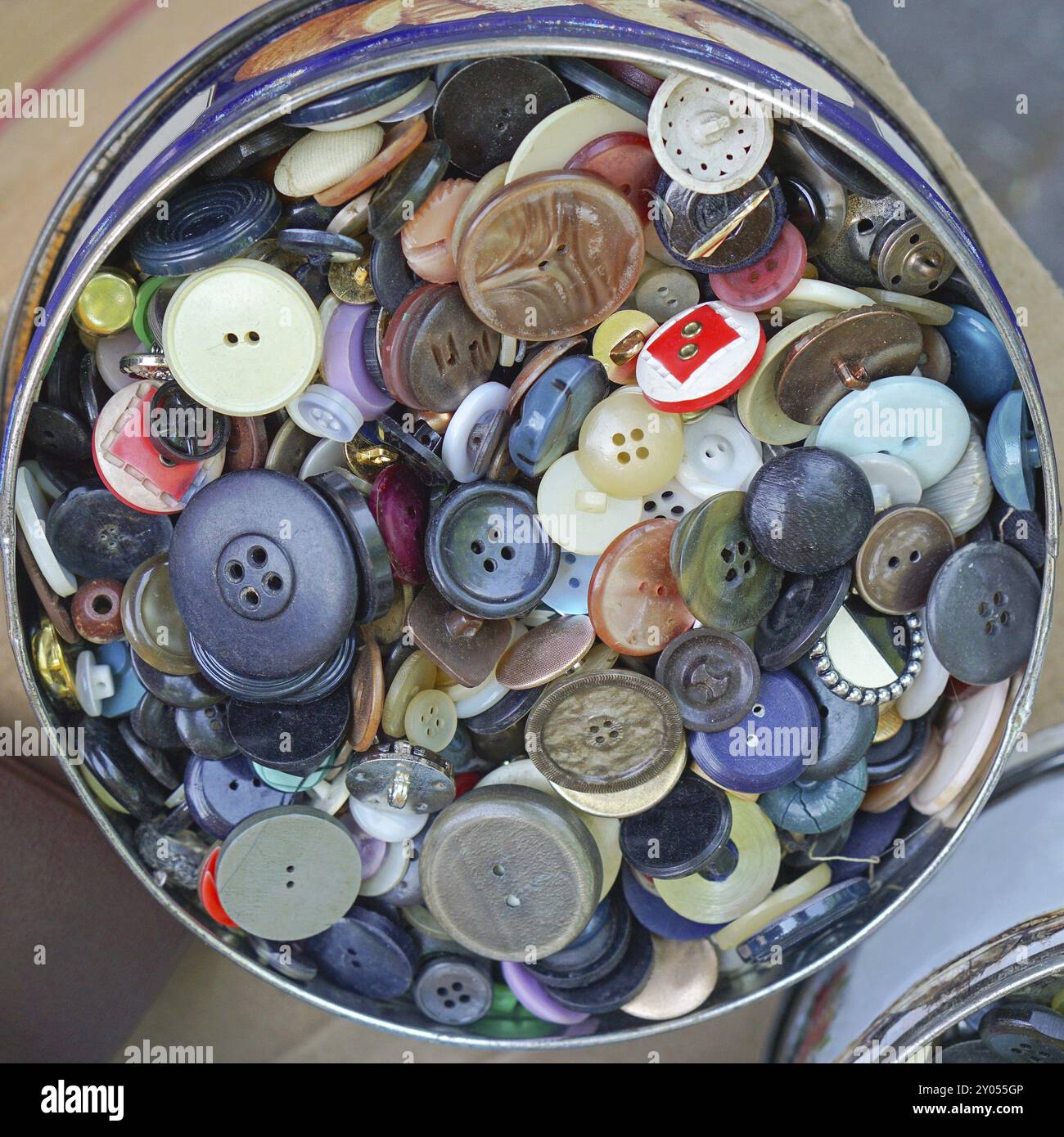 Lots of sewing buttons in the box Stock Photo - Alamy