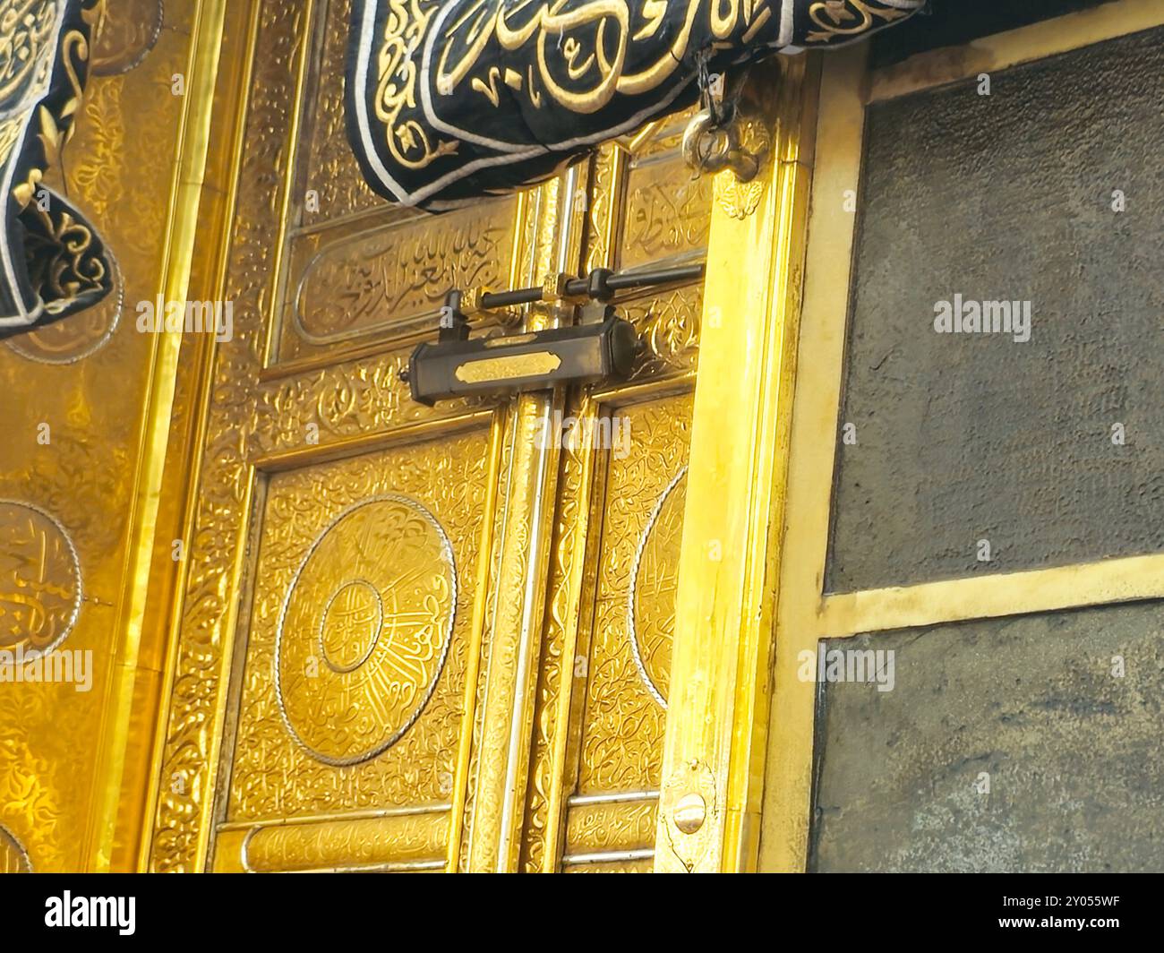 The golden door of Kaaba, The Kaaba a stone building at the center of ...