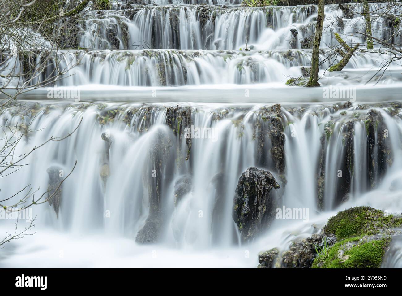 Many sinter terraces and basins have formed in the riverbed of the ...