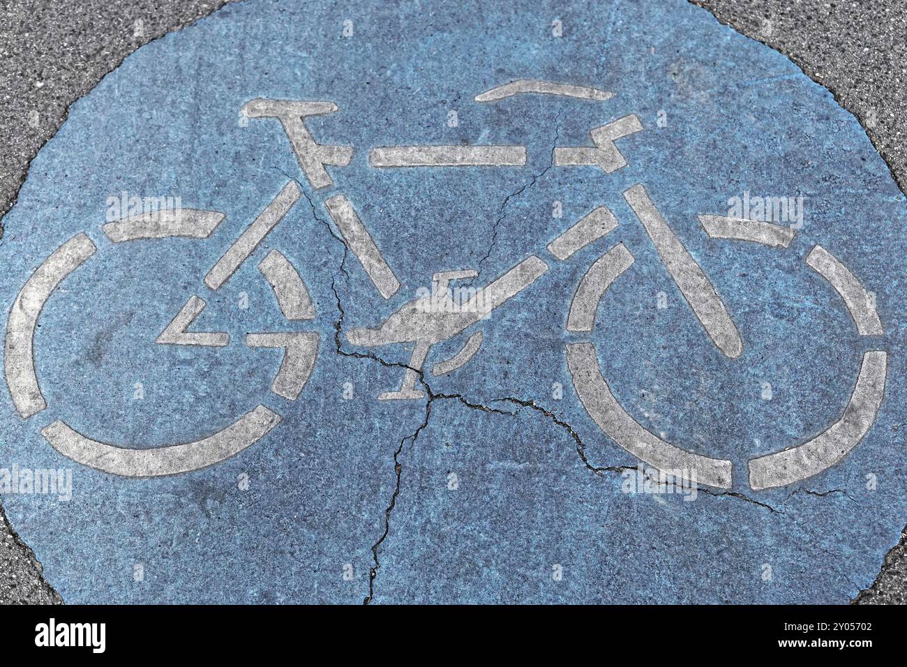 Bike path sign at street pavement Stock Photo - Alamy