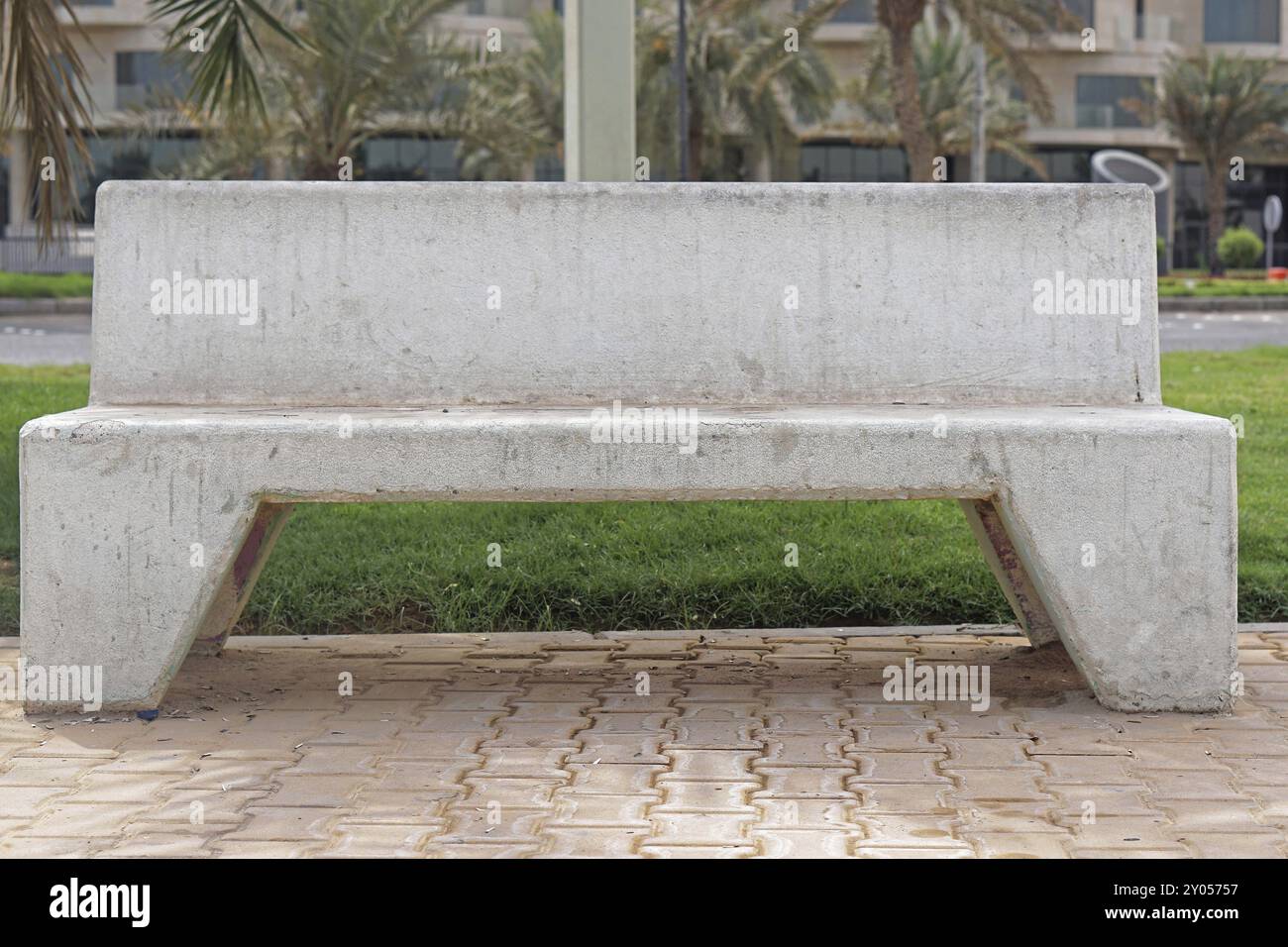 White concrete bench in Kuwait park Stock Photo - Alamy