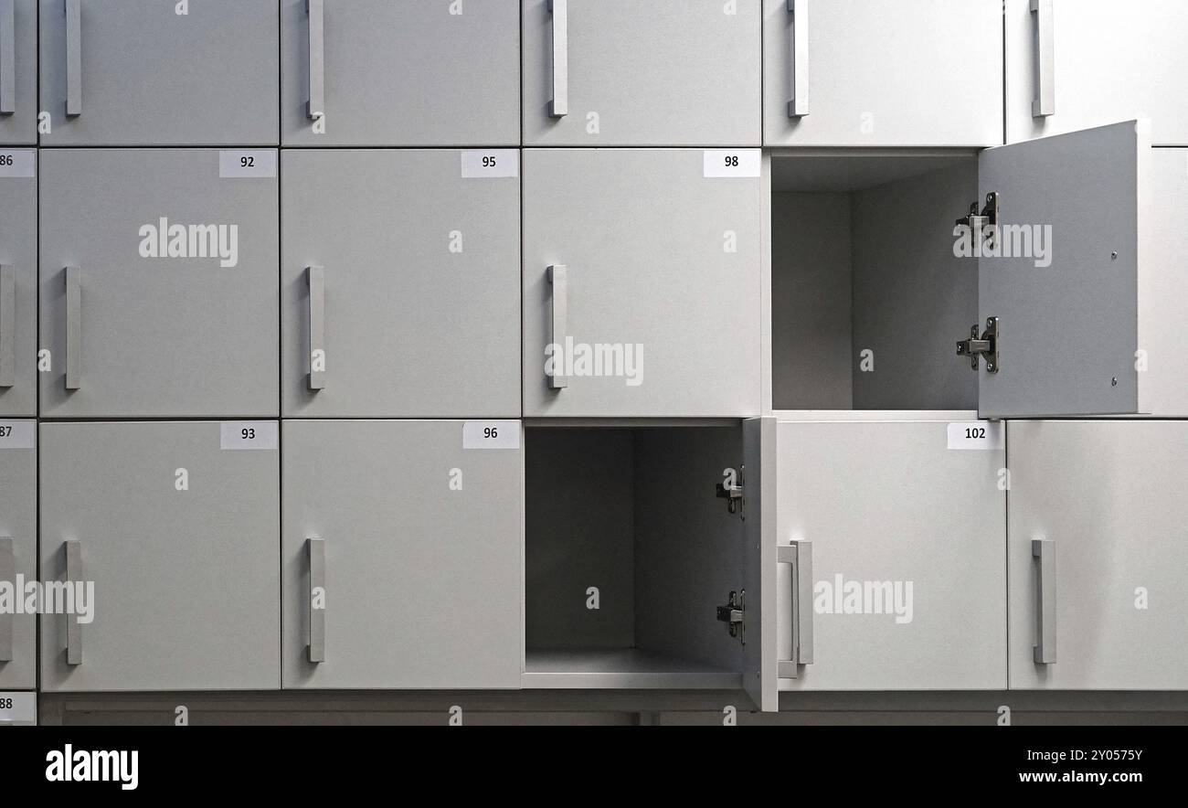 Small lockers storage compartments with numbers Stock Photo - Alamy
