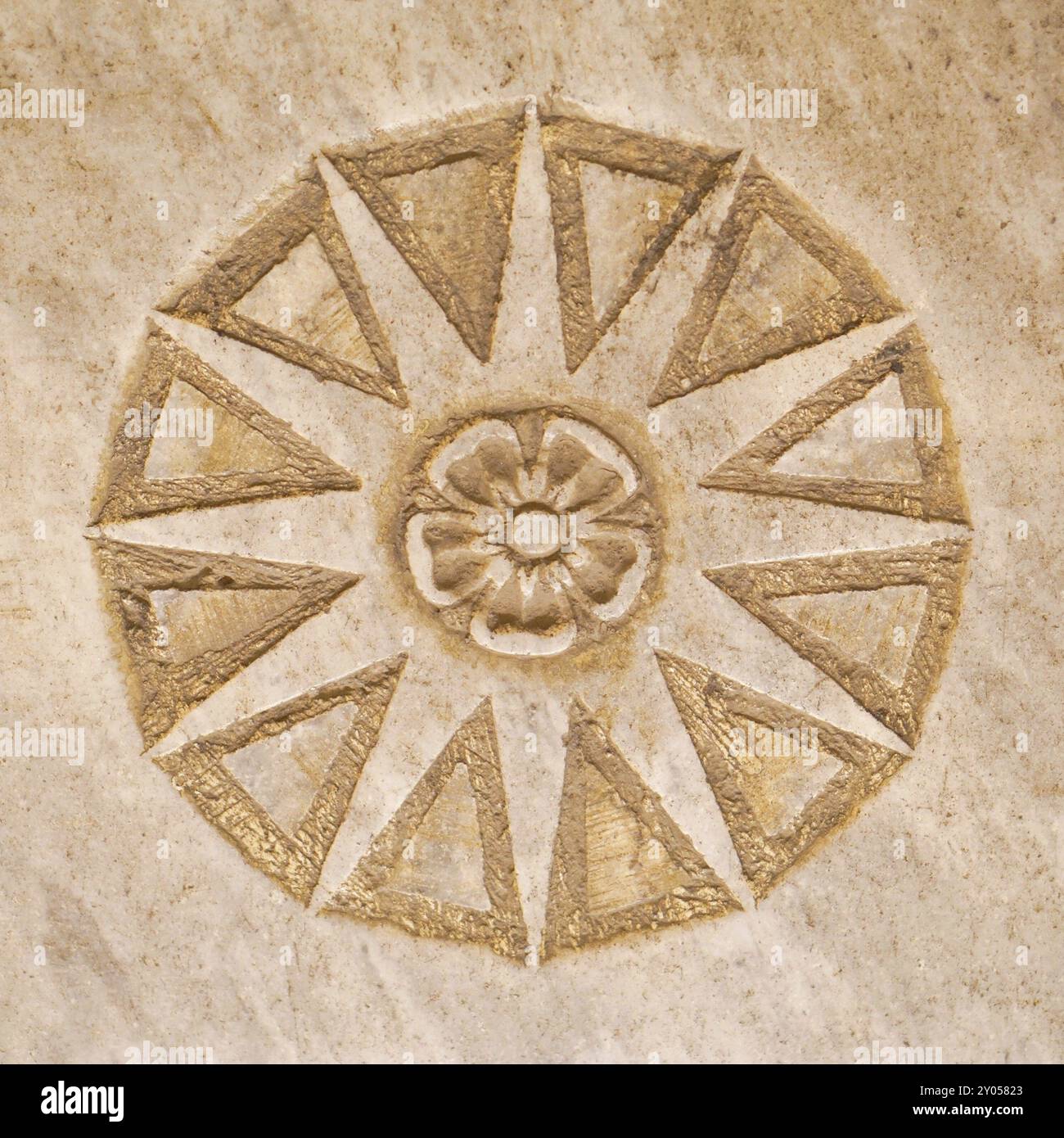 Carved star in marble floor tile Stock Photo - Alamy